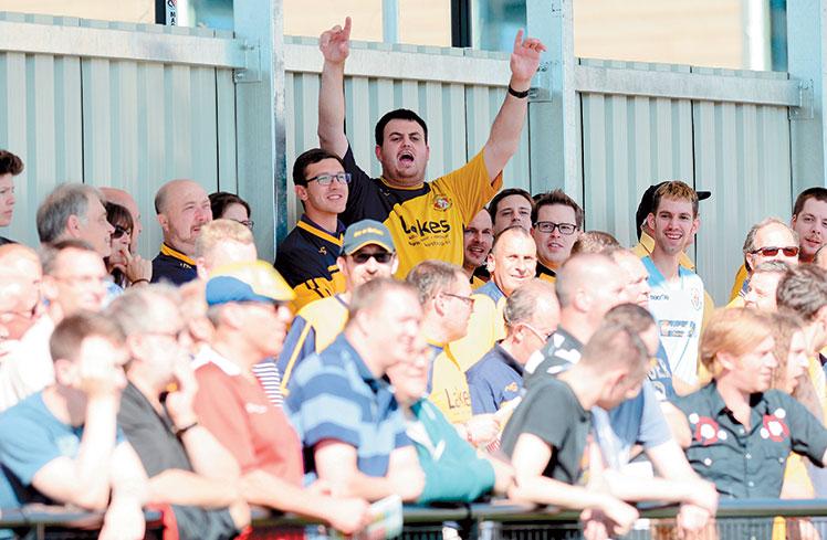 Wife of 'Mr Slough Town' proud to lead team out at club's return ...